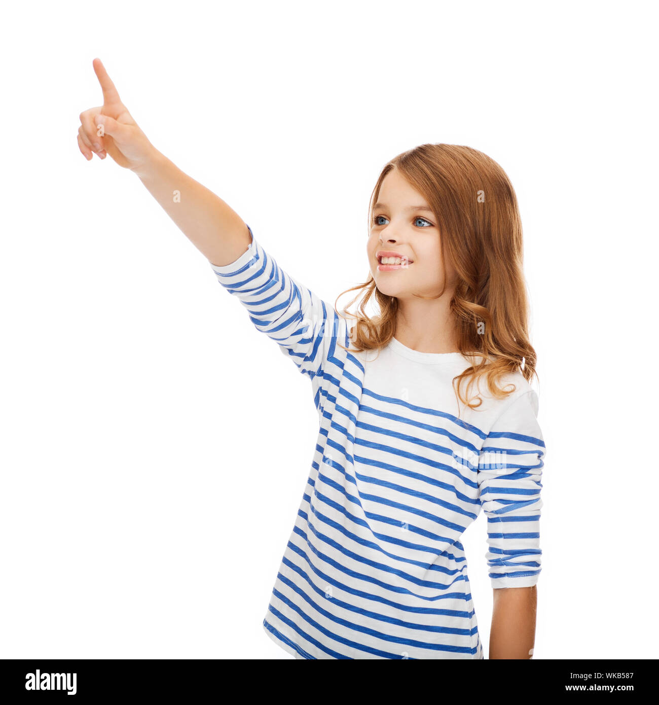 smiling girl pointing at virtual screen Stock Photo - Alamy
