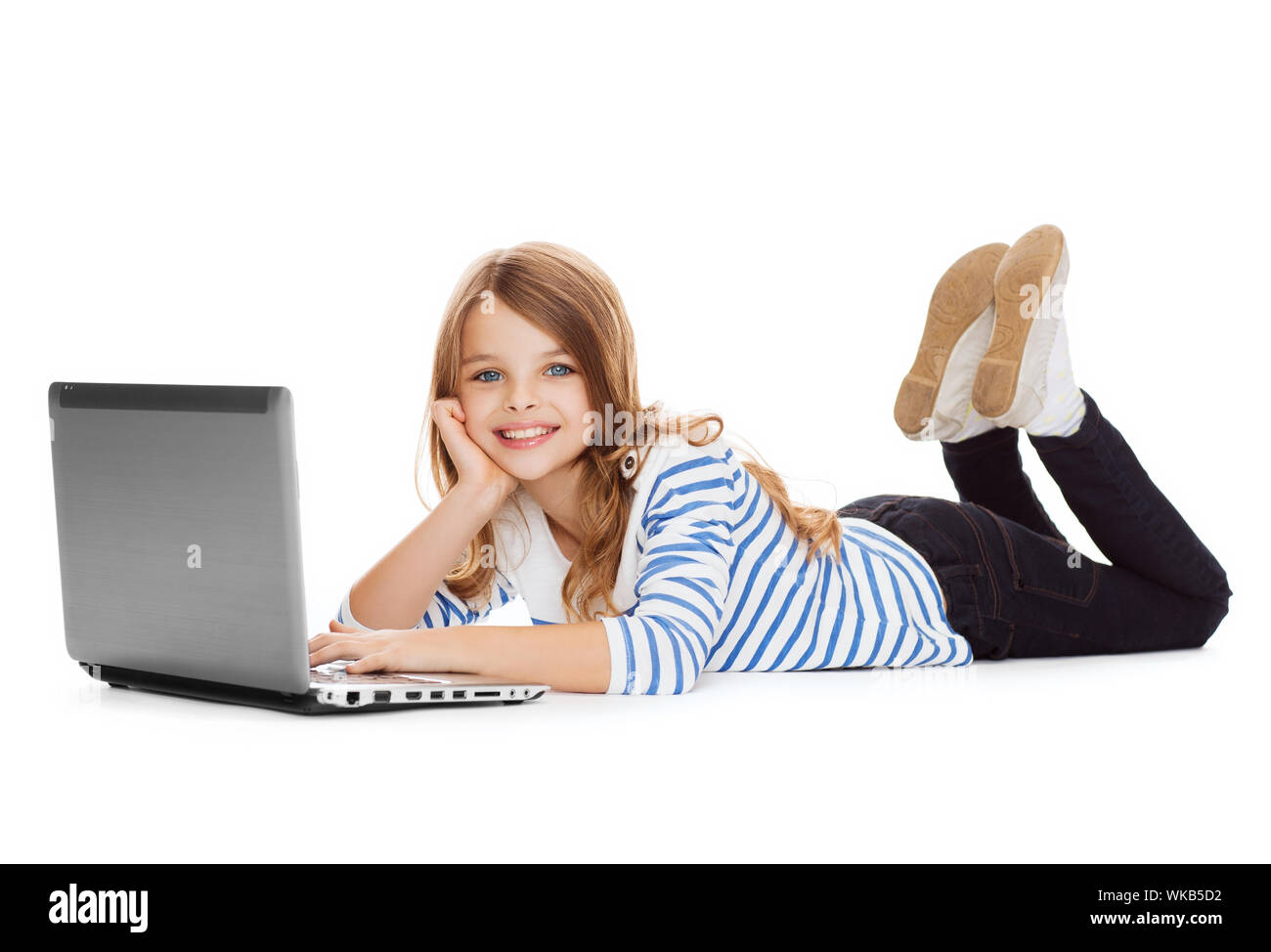 smiling student girl with laptop computer lying Stock Photo - Alamy