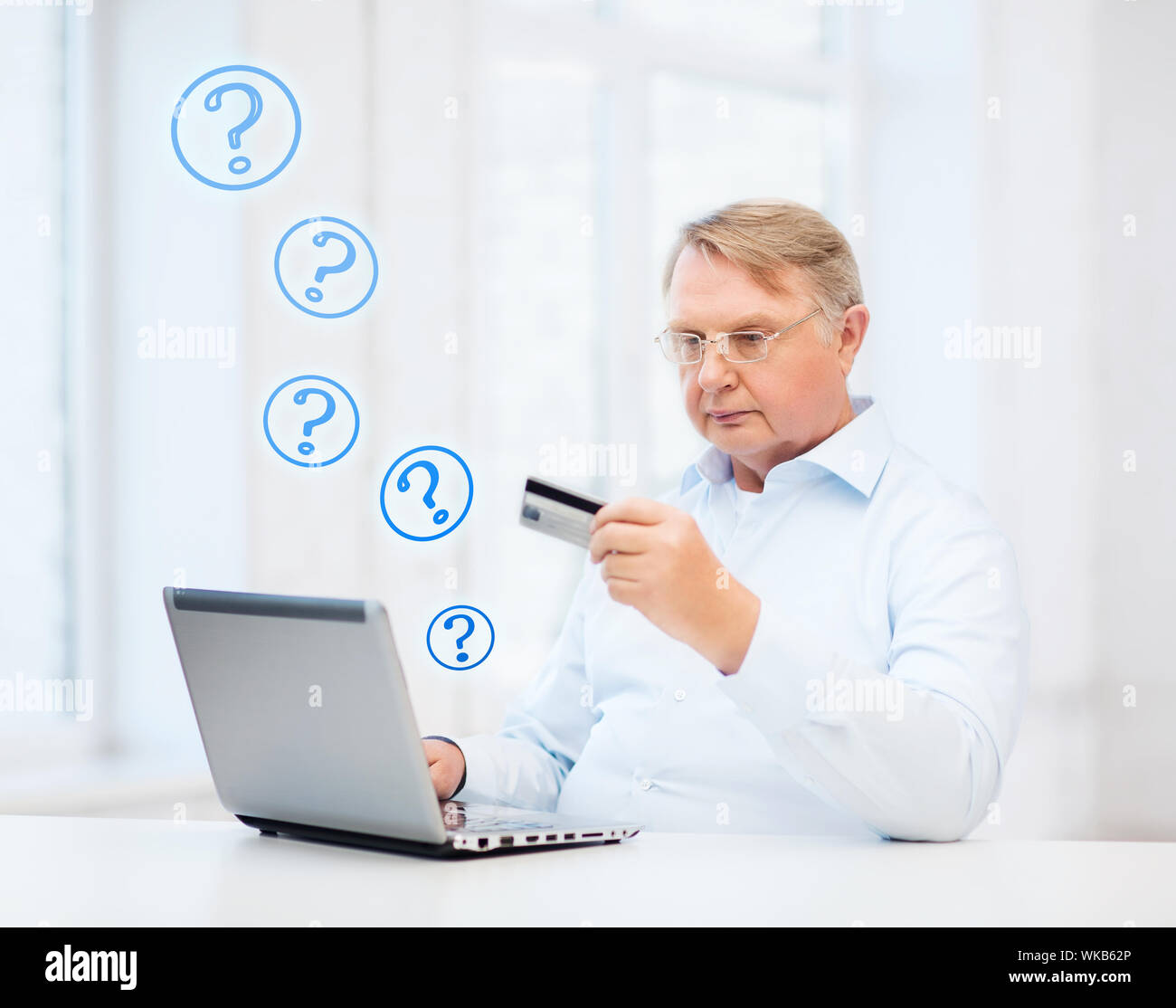 old man with laptop and credit card at home Stock Photo - Alamy