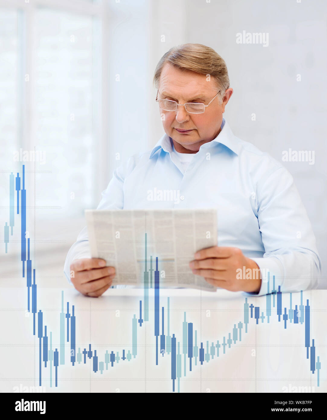 old man at home with newspaper and forex chart Stock Photo - Alamy