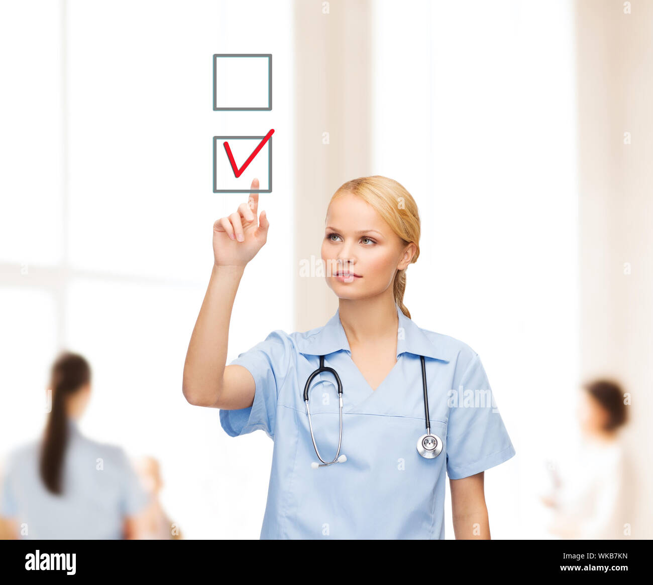 Hand pointing checklist checkmark hi-res stock photography and images ...