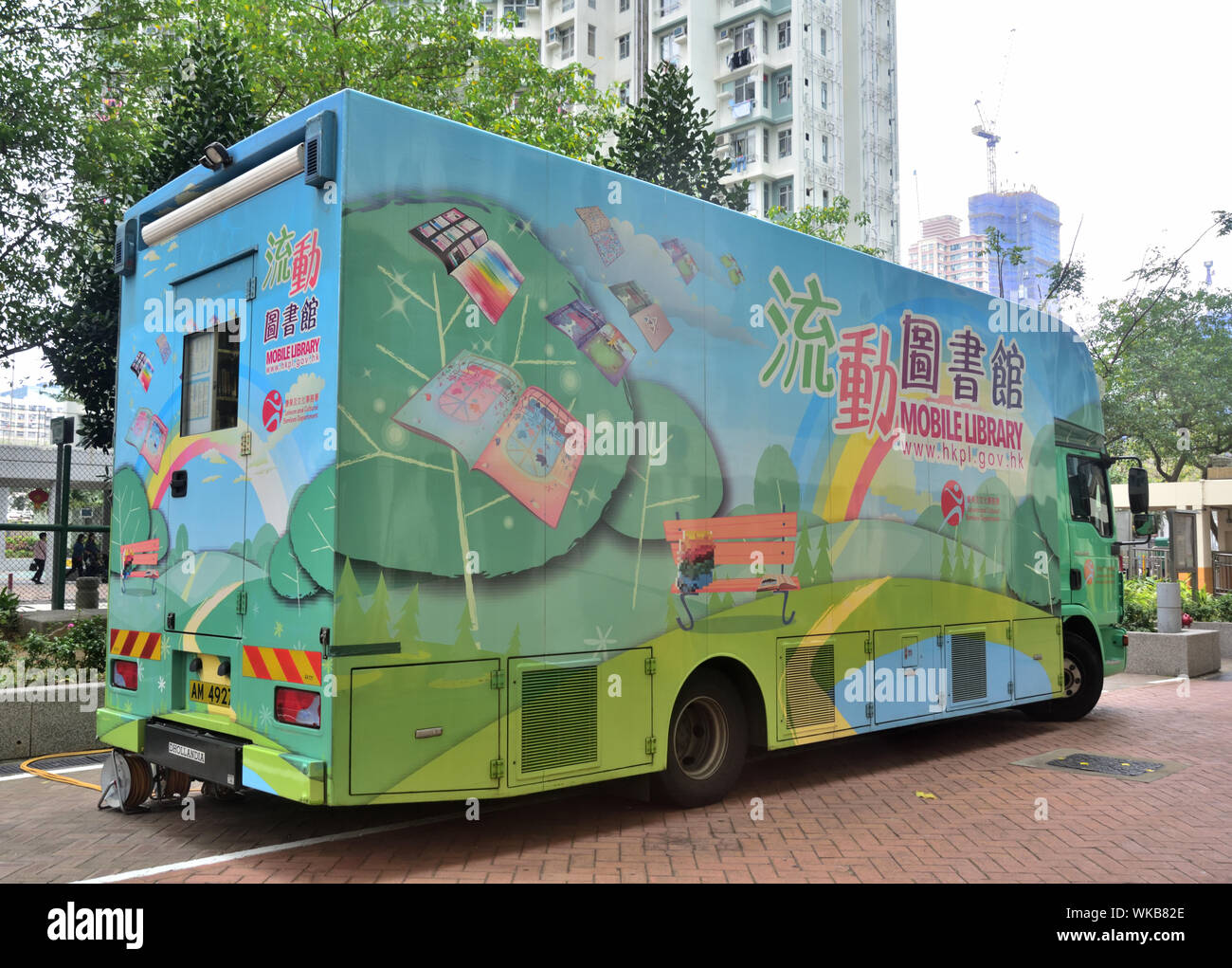 Mobile library on visit to a public house estate, Hong Kong Stock Photo ...