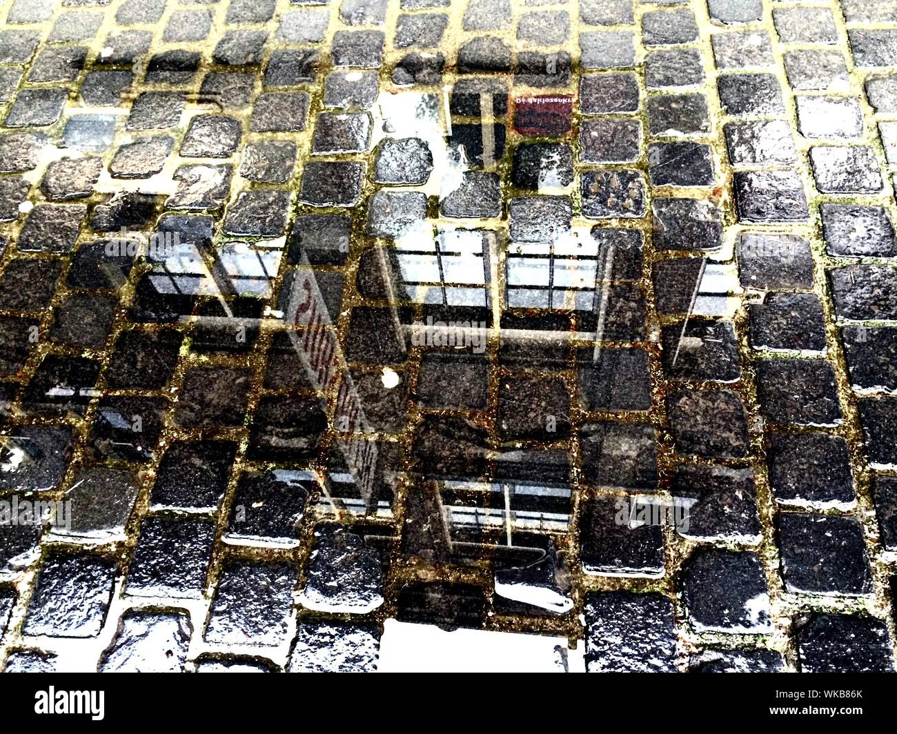 Puddle paving pavement hi-res stock photography and images - Alamy
