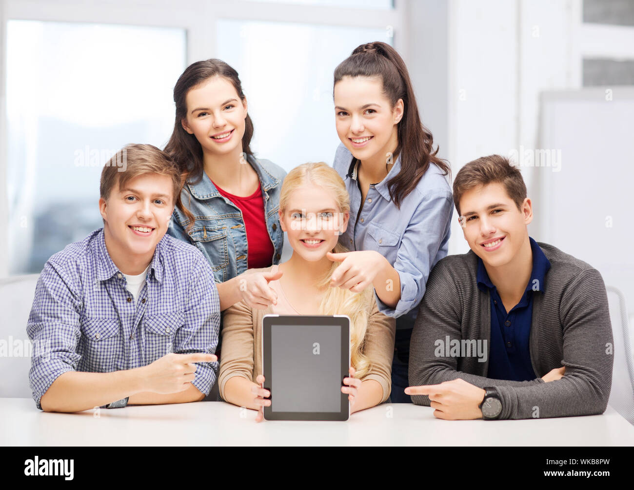 Group Of Girls Laughing Pointing High Resolution Stock Photography and ...