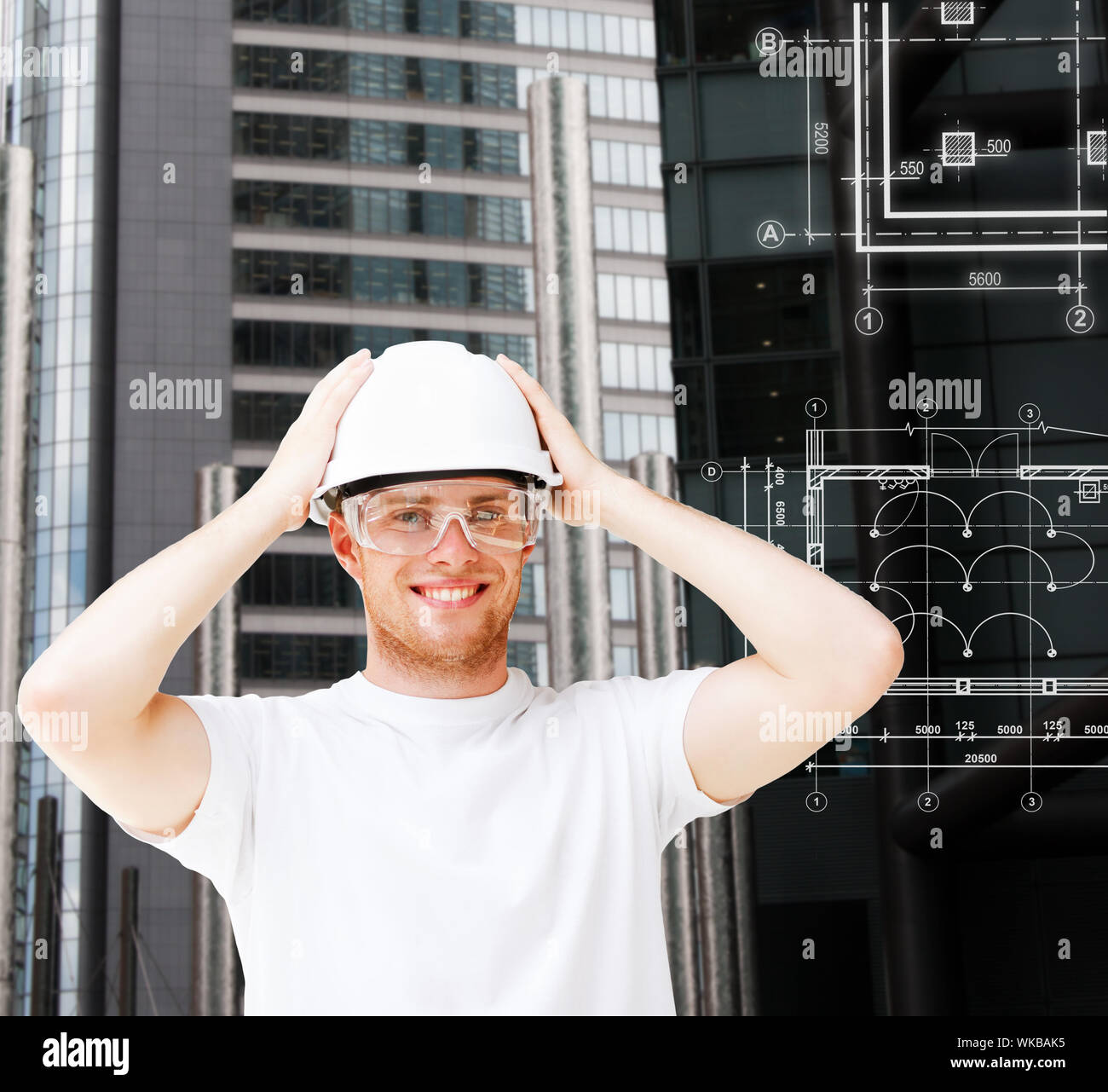 male architect in white helmet with safety glasses Stock Photo - Alamy
