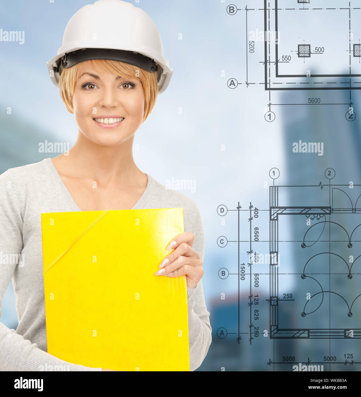 female contractor in white helmet with files Stock Photo - Alamy
