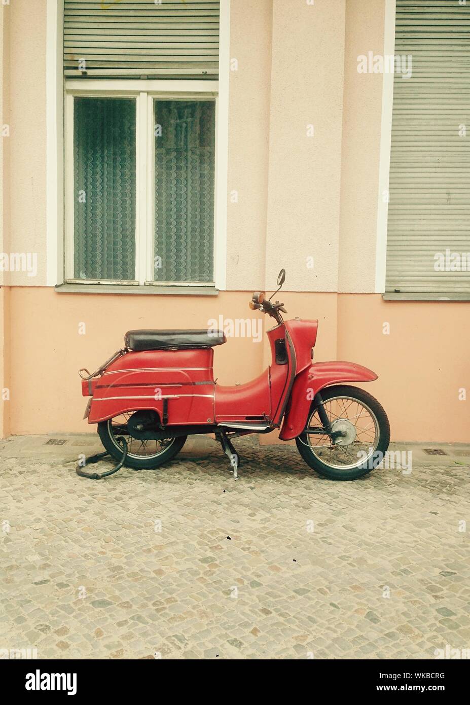 Old red scooter hi-res stock photography and images - Alamy