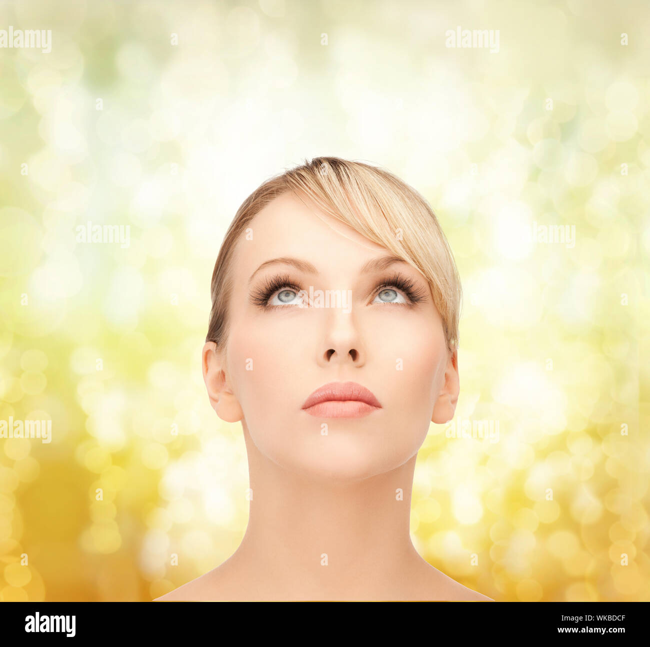 beautiful woman looking up Stock Photo - Alamy