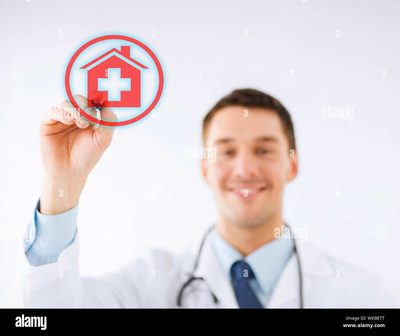 doctor drawing hospital sign in the air Stock Photo - Alamy
