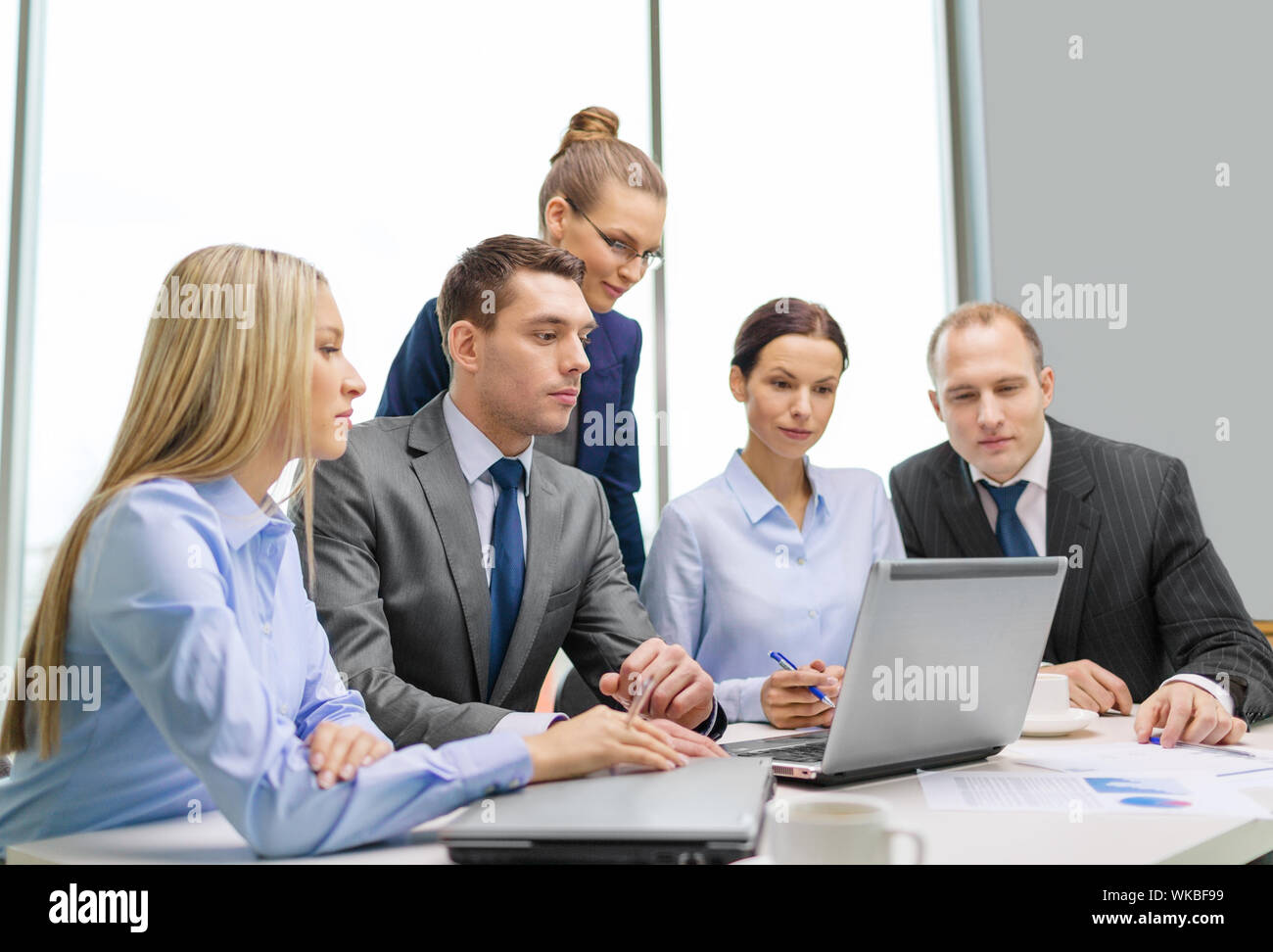 Group discussion happy documents hi-res stock photography and images ...