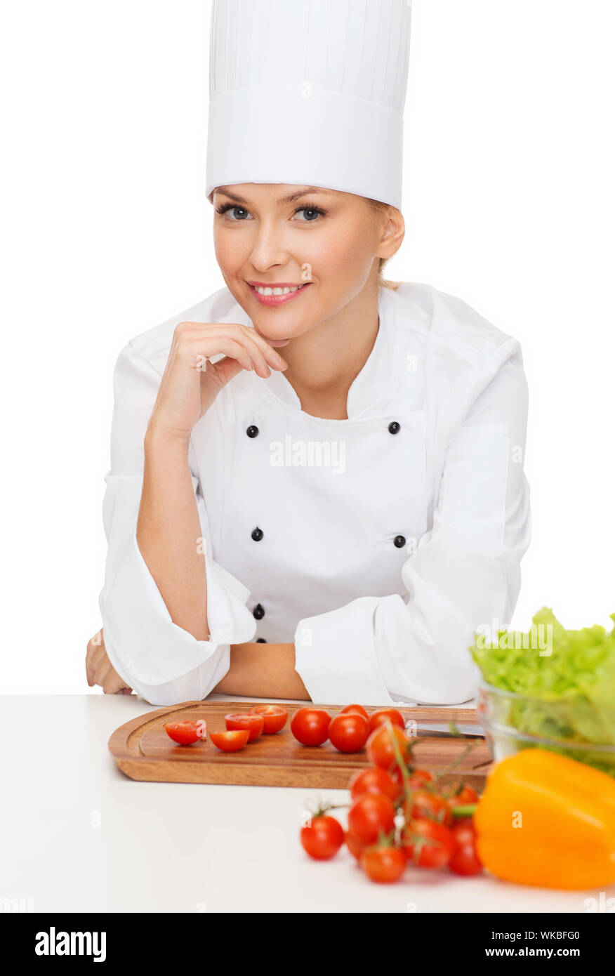 smiling female chef with vagetables Stock Photo - Alamy