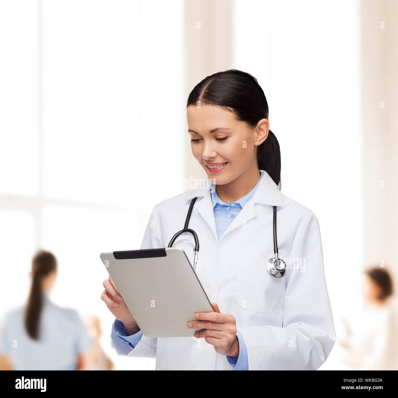 female doctor with stethoscope and tablet pc Stock Photo - Alamy