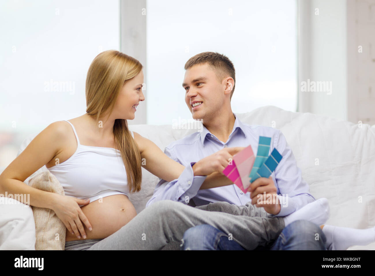 parenthood, renovation and pregnancy concept - smiling expecting ...