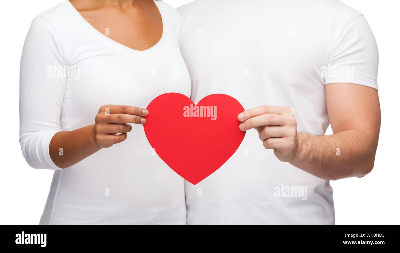 closeup of couple hands with heart Stock Photo - Alamy