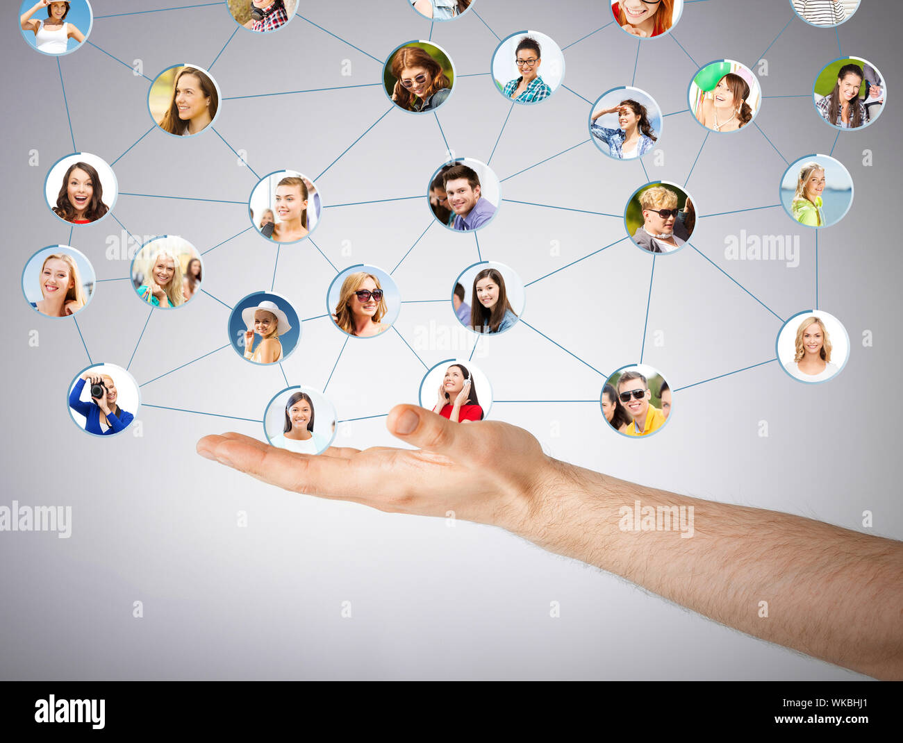 networking and communication concept - closeup of mans hand showing ...