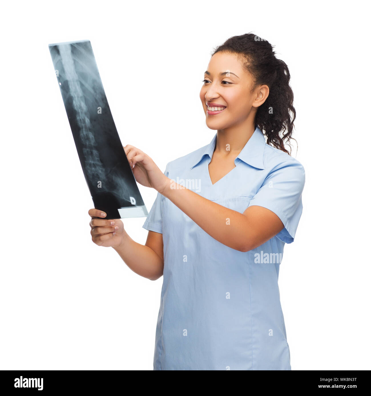 healthcare, medicine and radiology concept - smiling female african ...