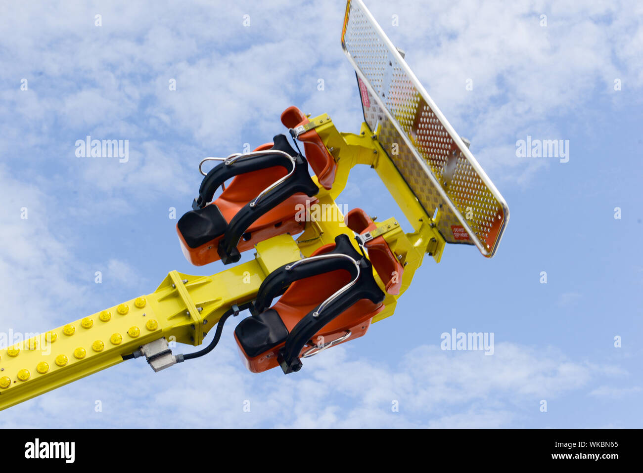 Empty Mechanical fair ground ride with sky in background Stock Photo ...