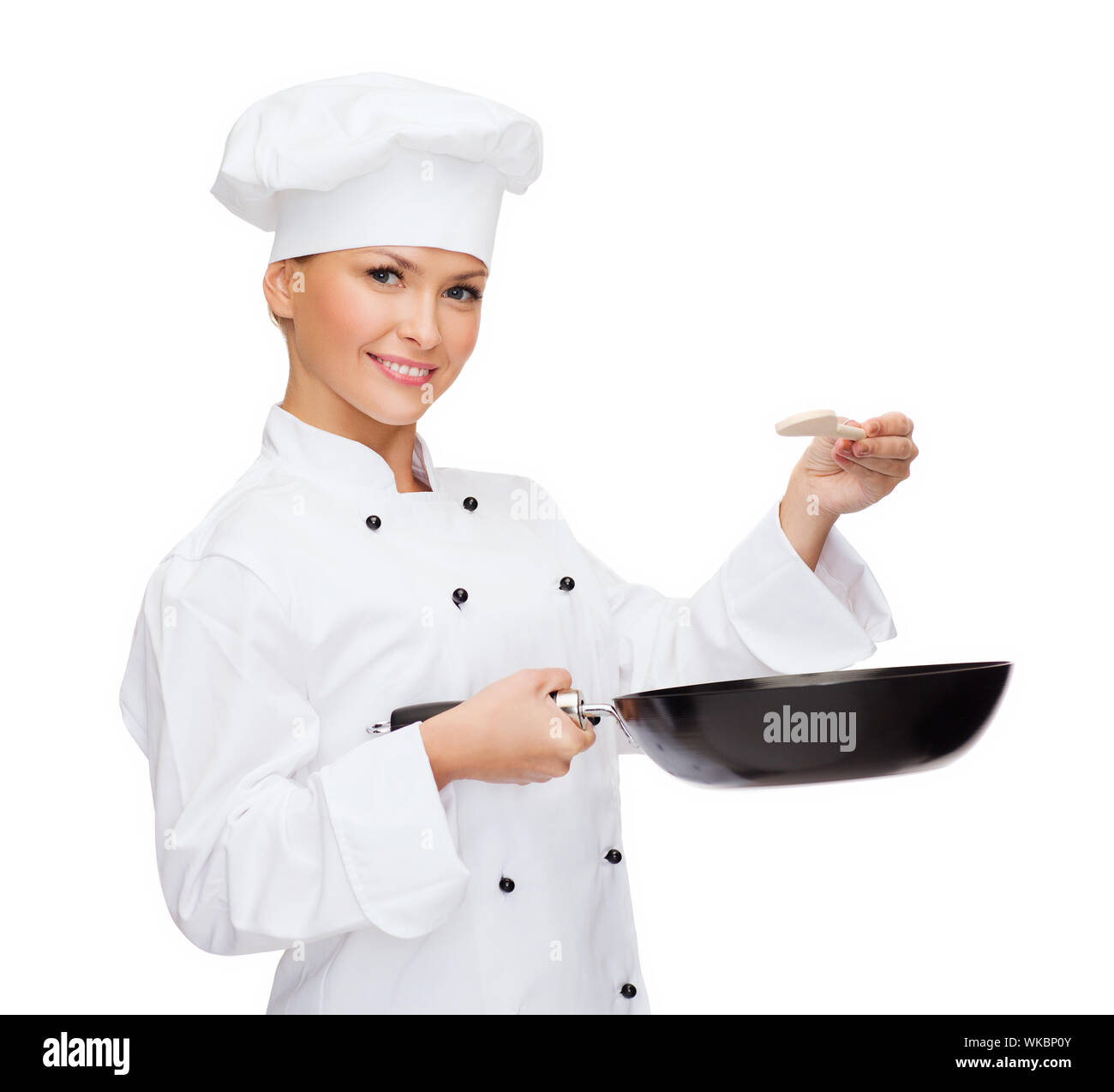 smiling female chef with pan and spoon Stock Photo - Alamy