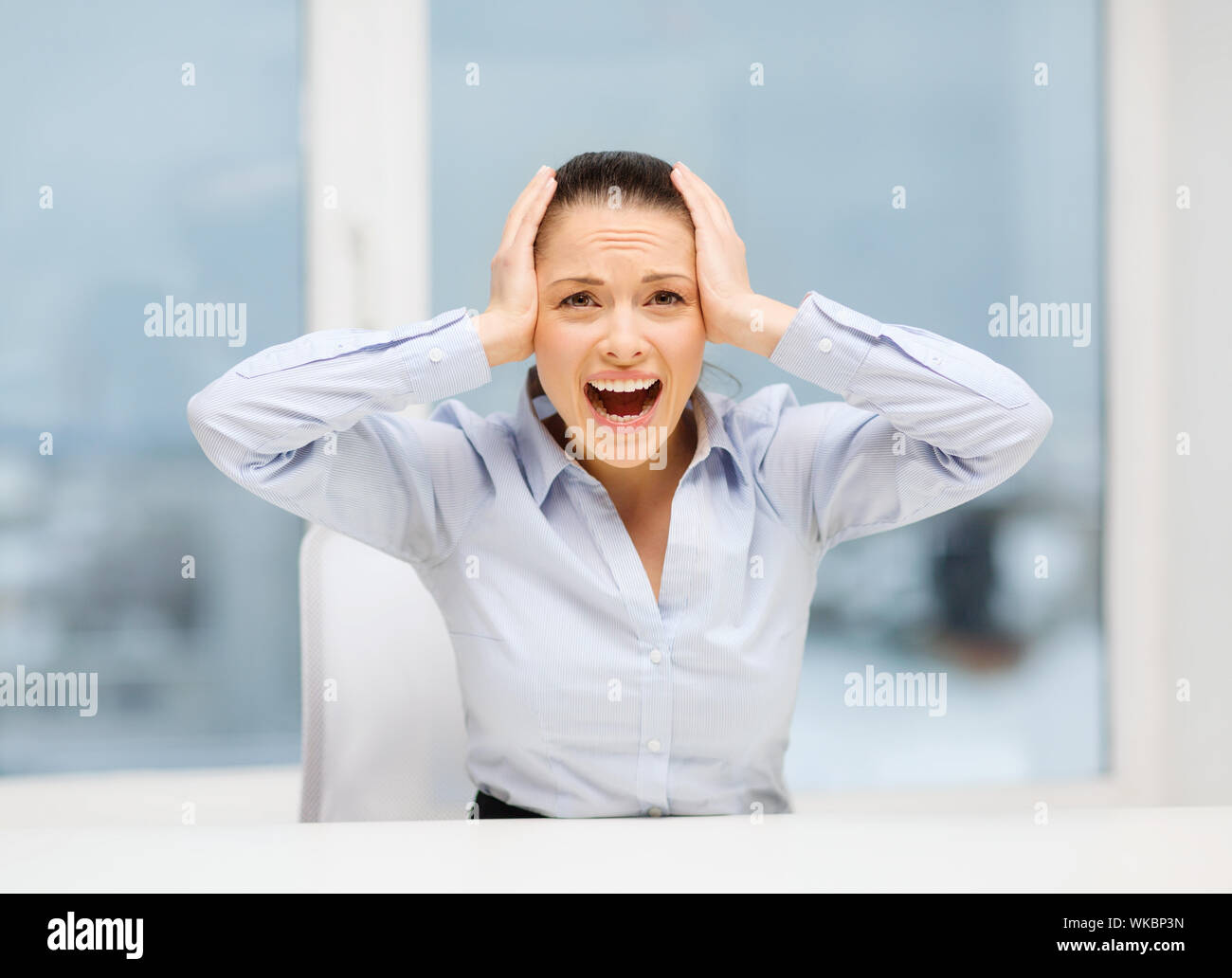 angry screaming businesswoman in office Stock Photo - Alamy