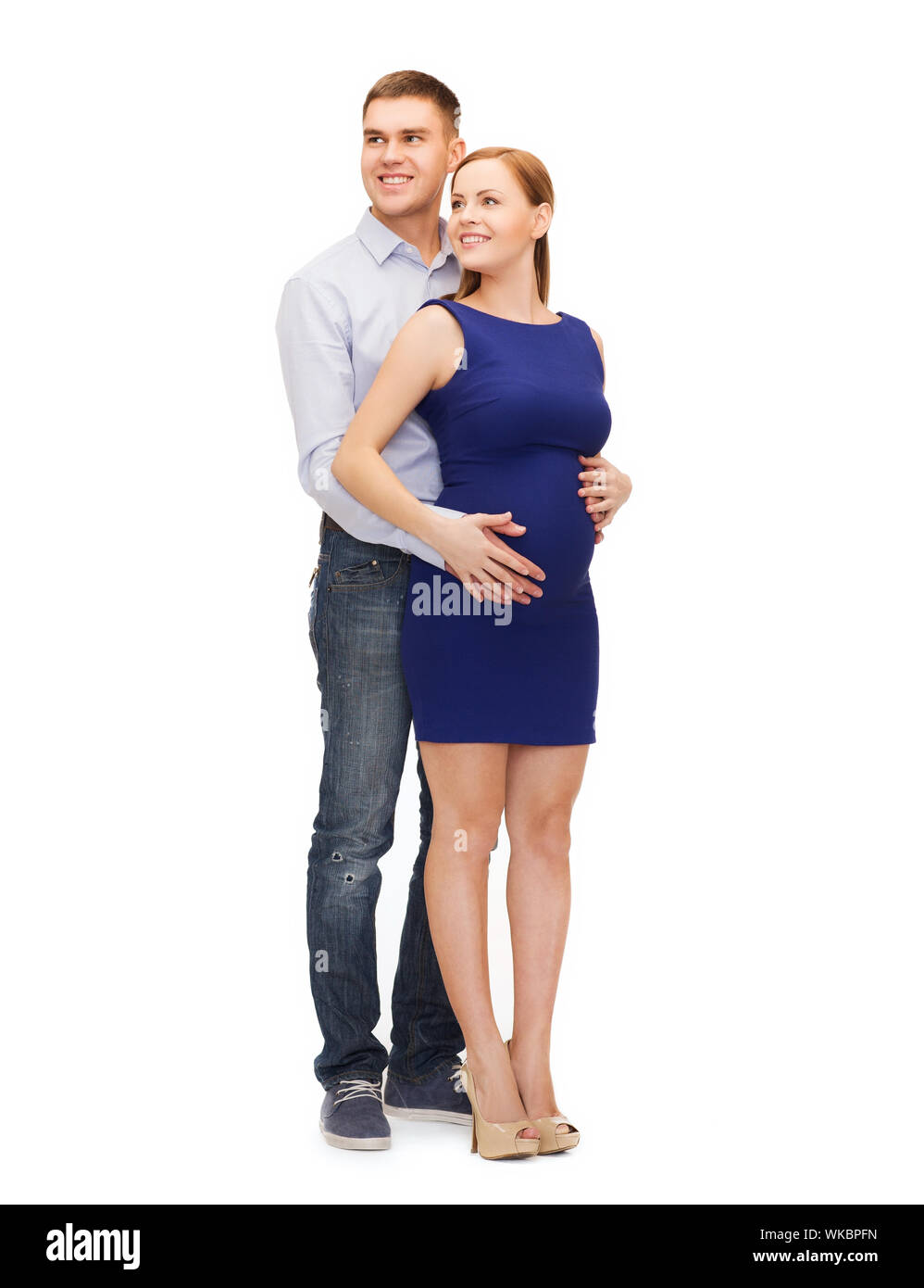 pregnancy, parenthood and happiness concept - happy young family ...