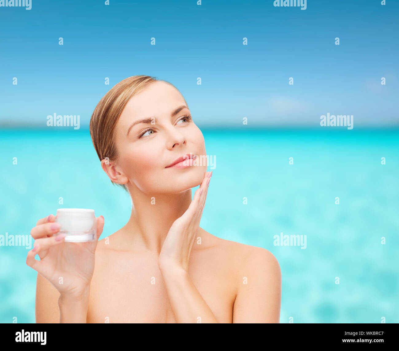 Cosmetics Health And Beauty Concept Beautiful Woman Applying Cream