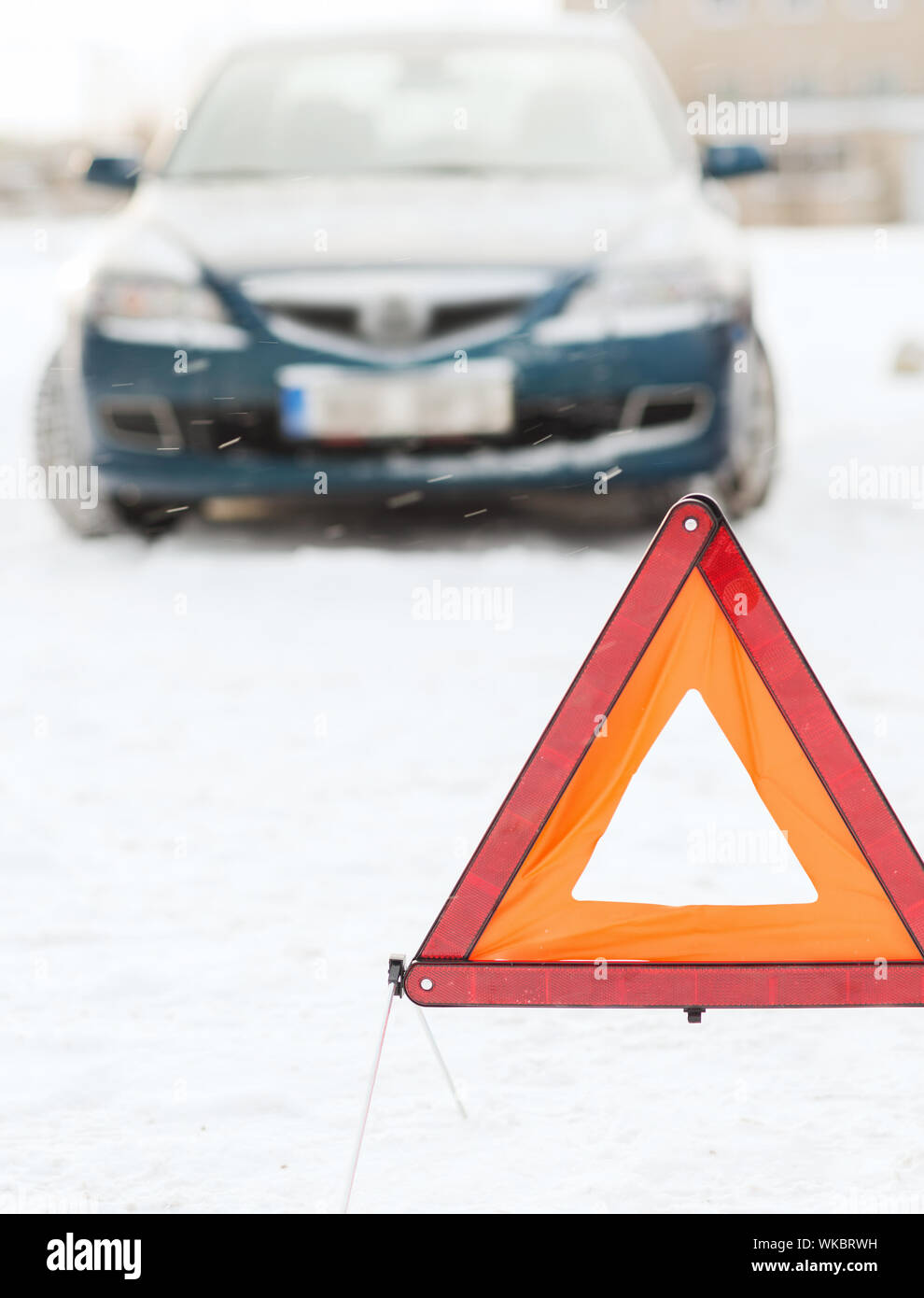 closeup of warning triangle and car Stock Photo - Alamy