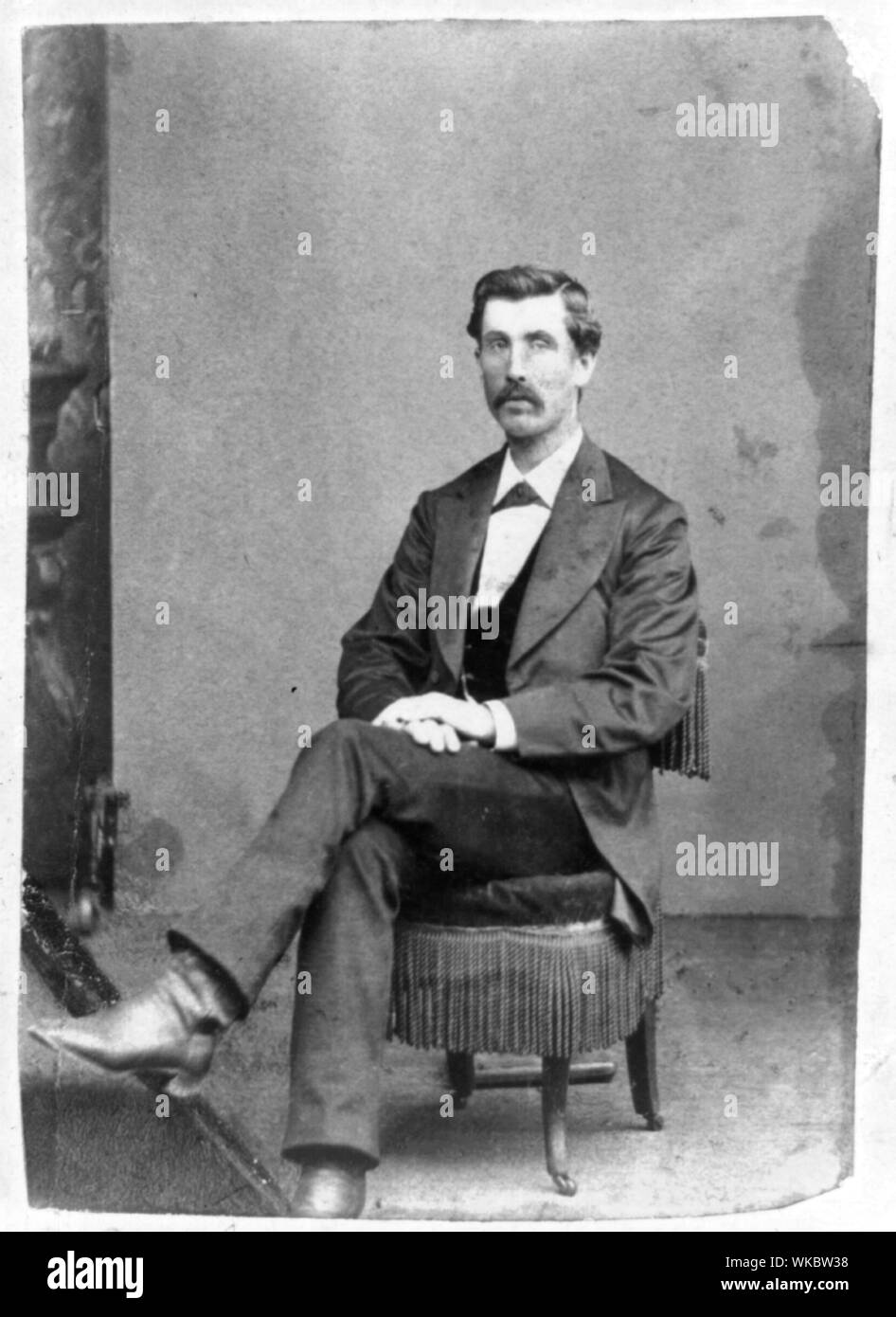 Jeff Whitman, full-length portrait, seated, facing left Stock Photo - Alamy