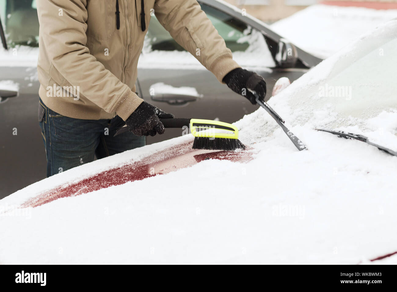Man Clearing Snow From Car High Resolution Stock Photography and Images ...