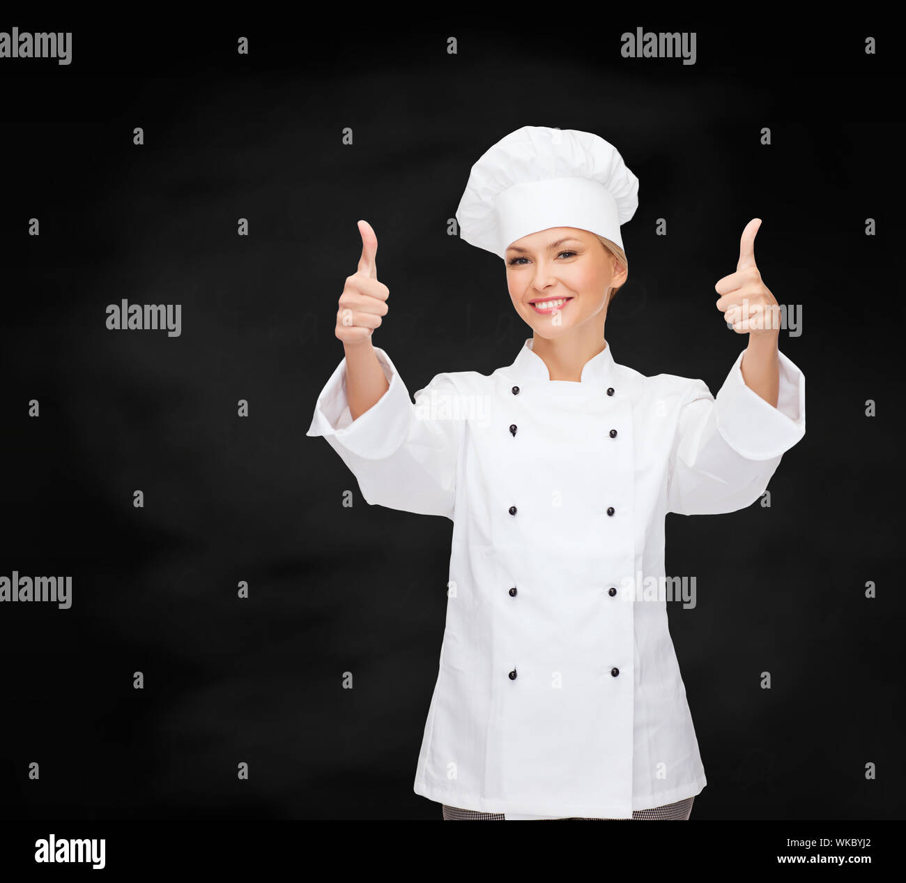 cooking, gesture and food concept - smiling female chef, cook or baker ...