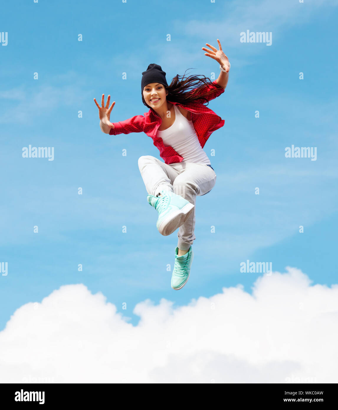 beautiful dancing girl jumping Stock Photo - Alamy