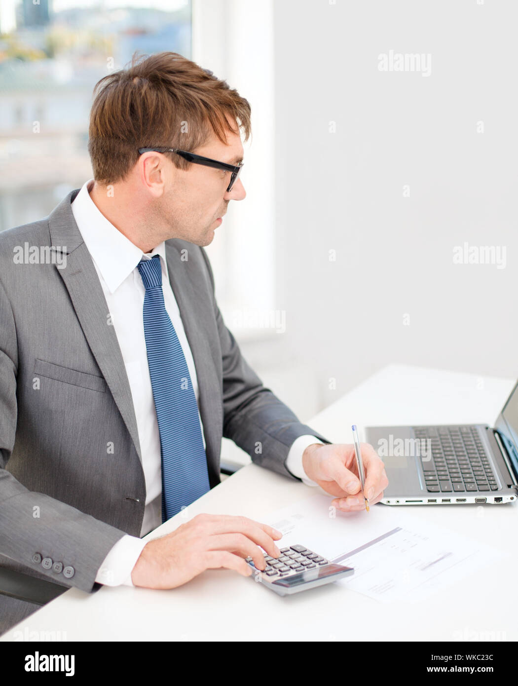 business, office, school and education concept - businessman with ...