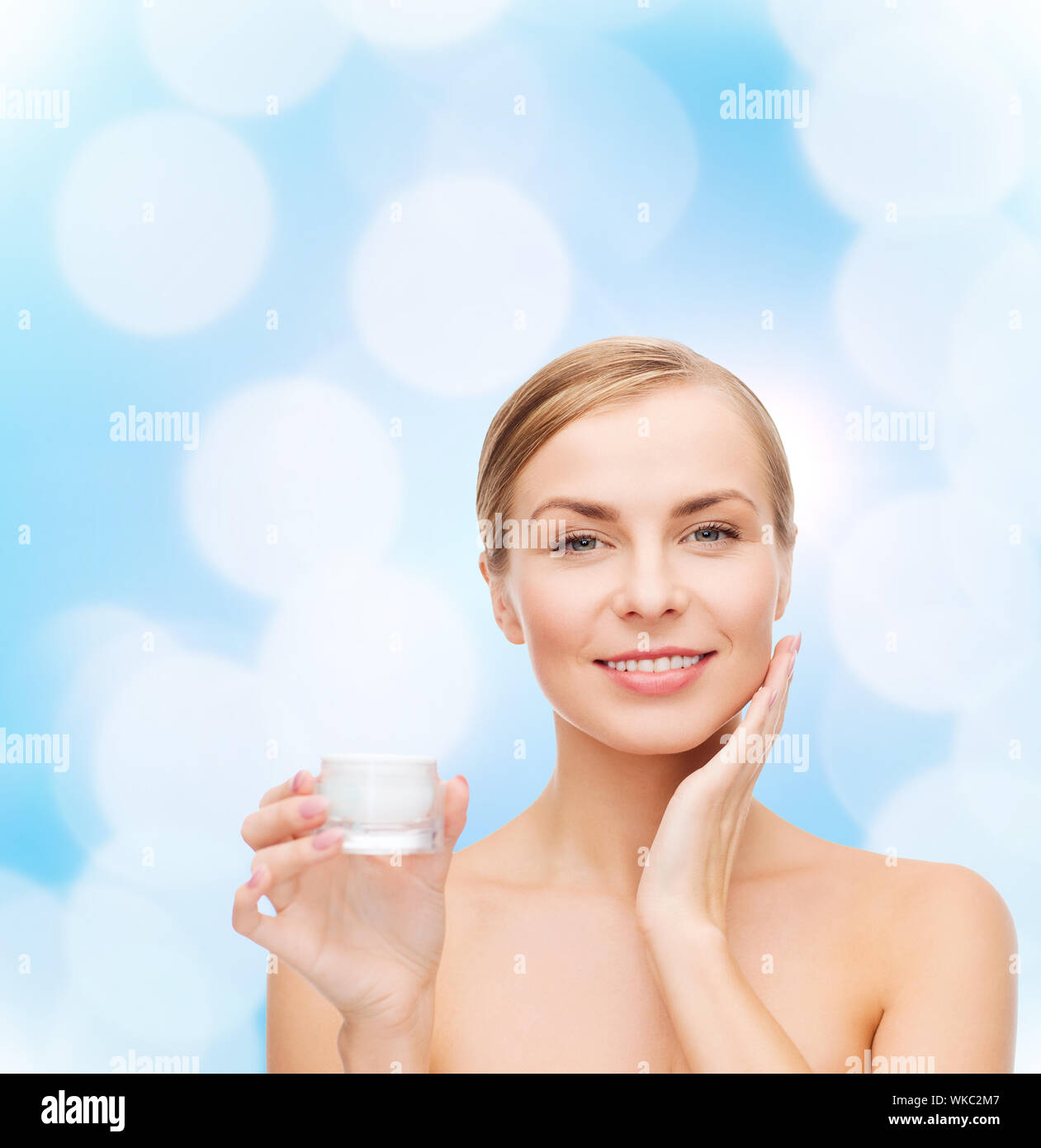 Cosmetics Health And Beauty Concept Beautiful Woman Applying Cream