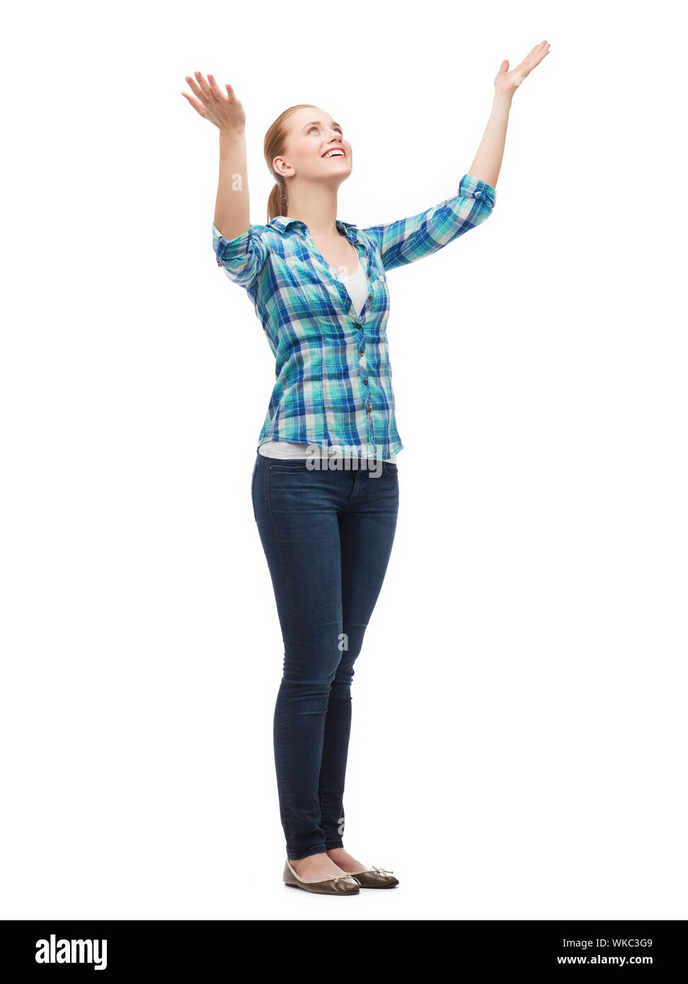 smiling young woman waving hands Stock Photo - Alamy