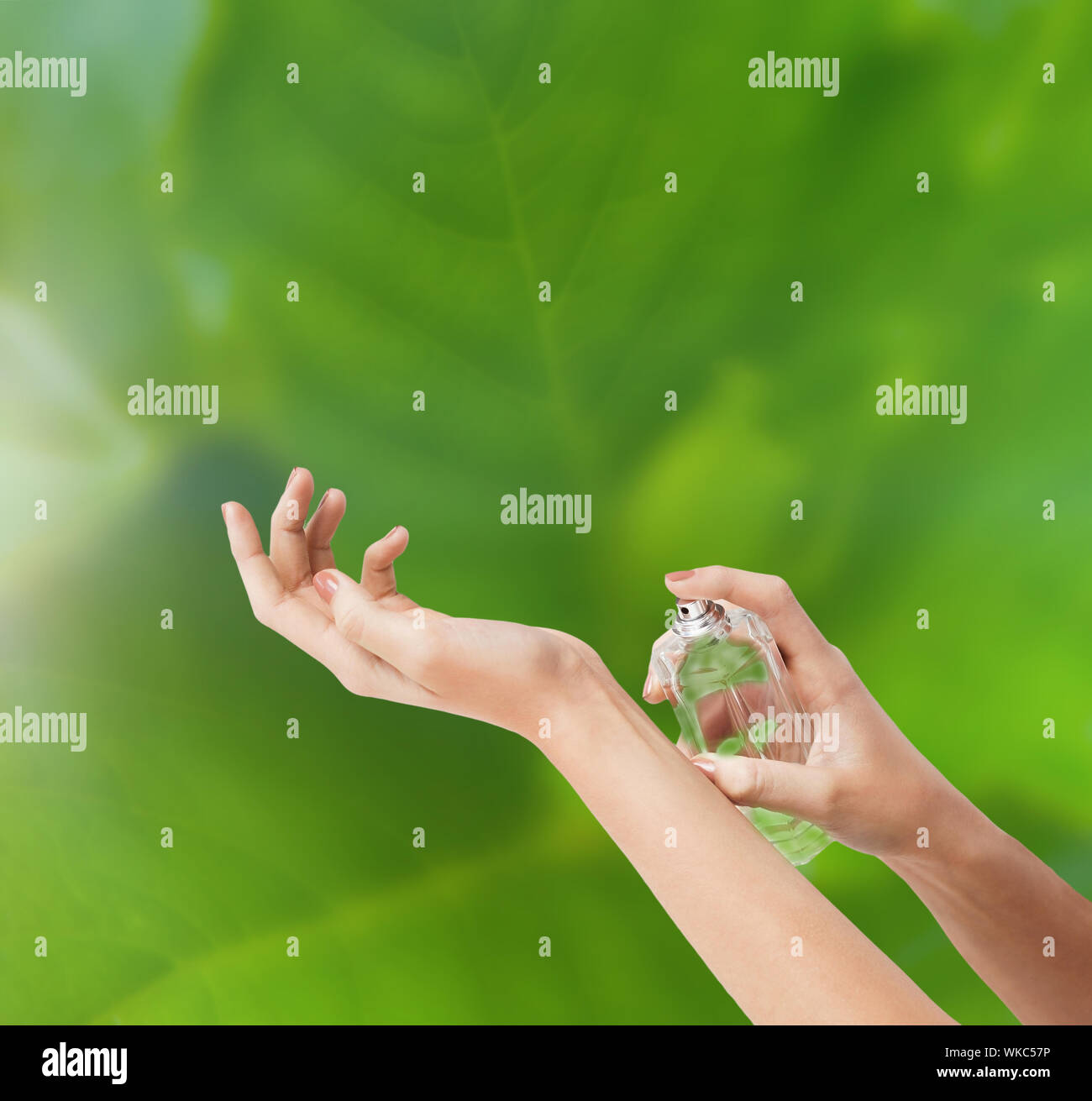 woman hands spraying perfume Stock Photo - Alamy