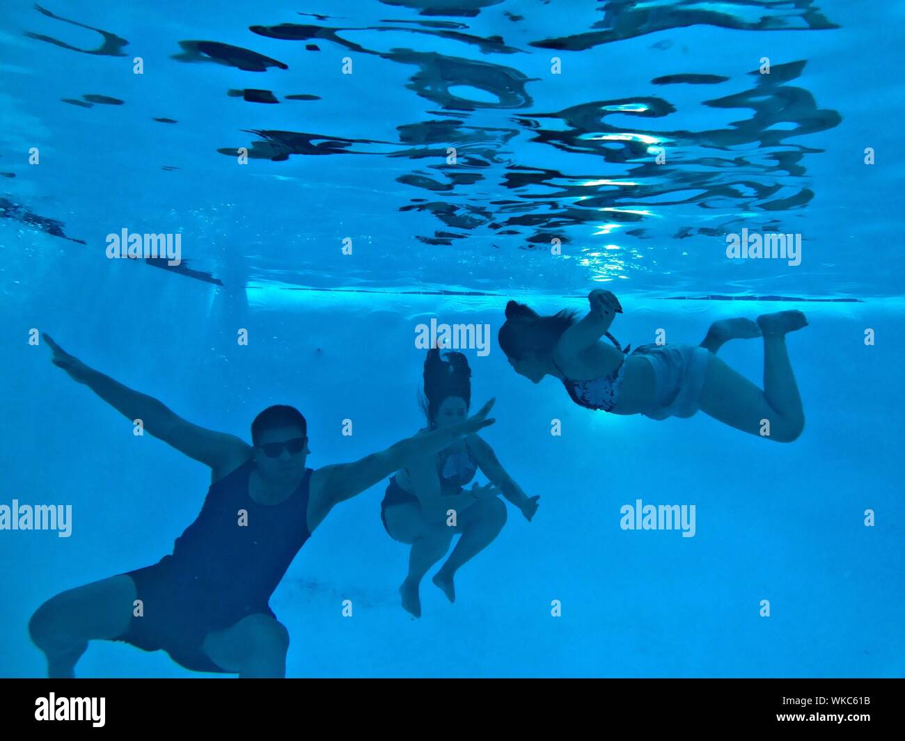 Friends swimming pool hi-res stock photography and images - Alamy