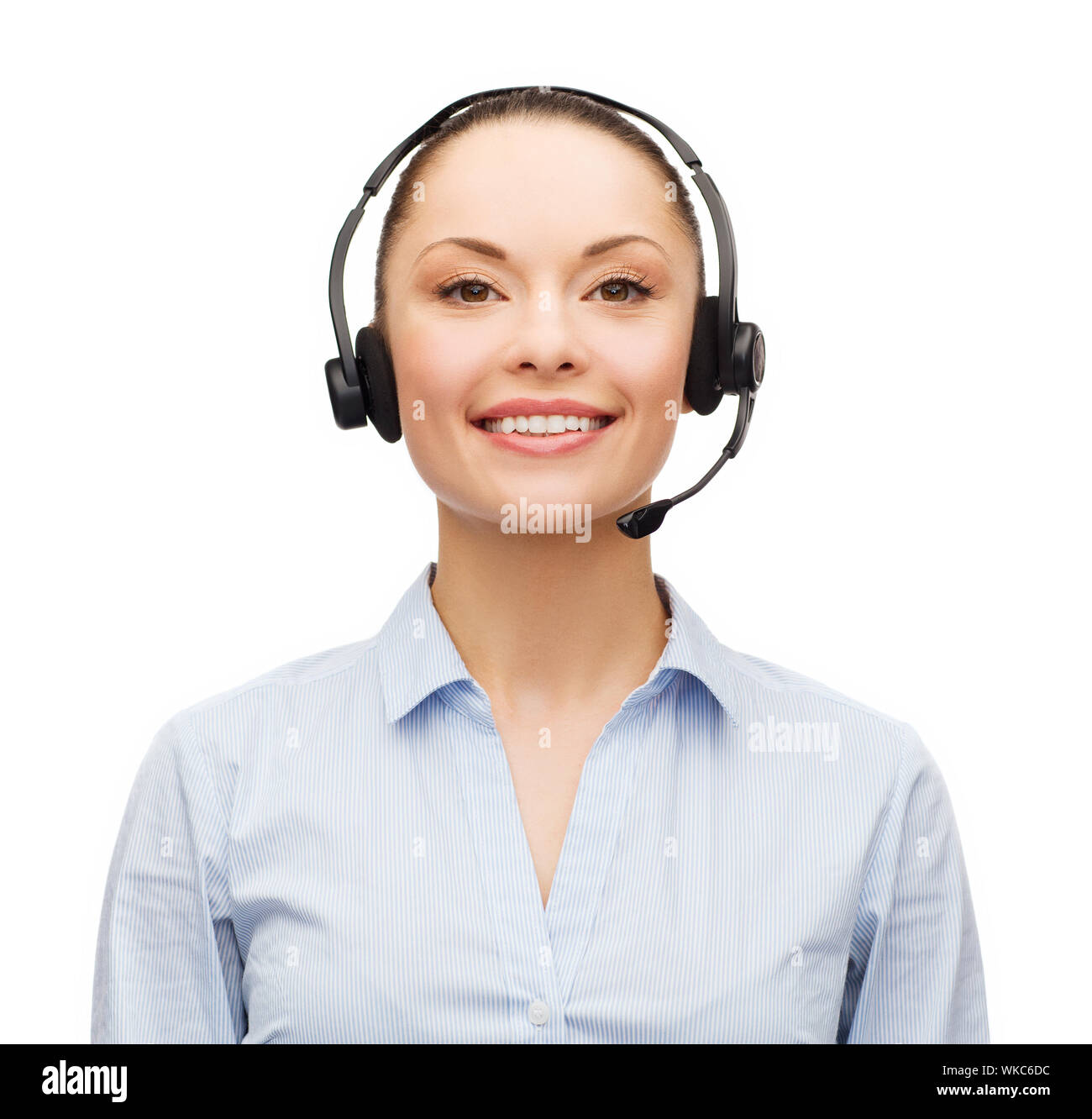 friendly female helpline operator with headphones Stock Photo - Alamy