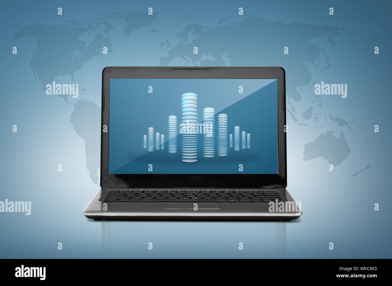 technology and advertisement concept - laptop computer with skyscrapers ...