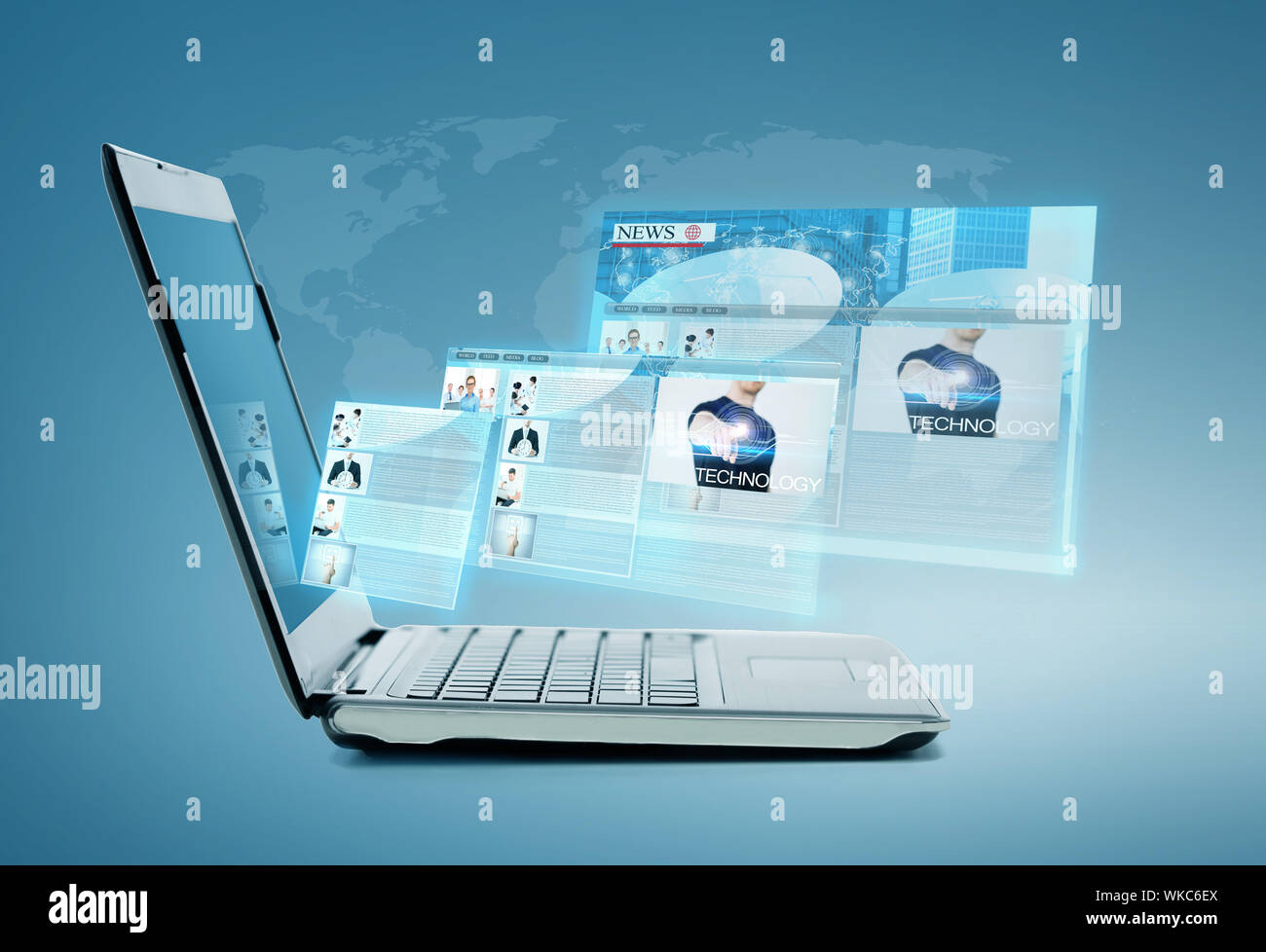 laptop computer with news on screen Stock Photo - Alamy