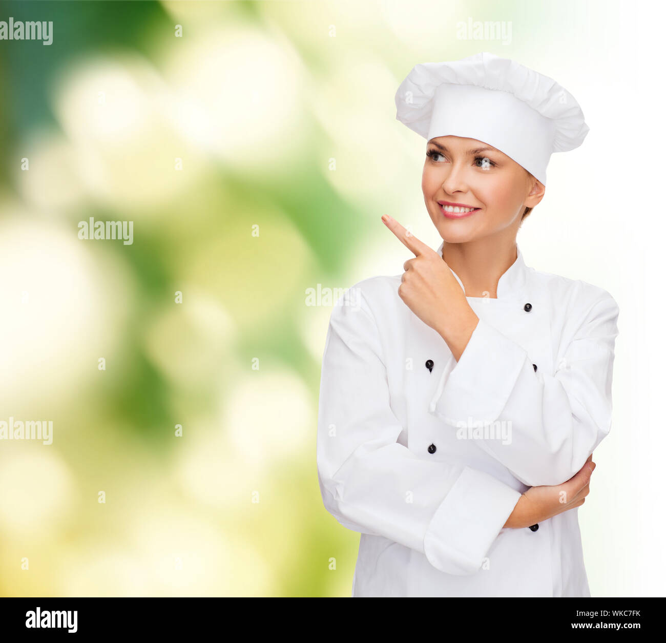 cooking, advertisement and food concept - smiling female chef, cook or ...