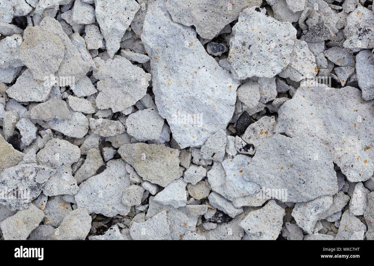 Concrete rubble - the remains of the destroyed stone wall Stock Photo ...