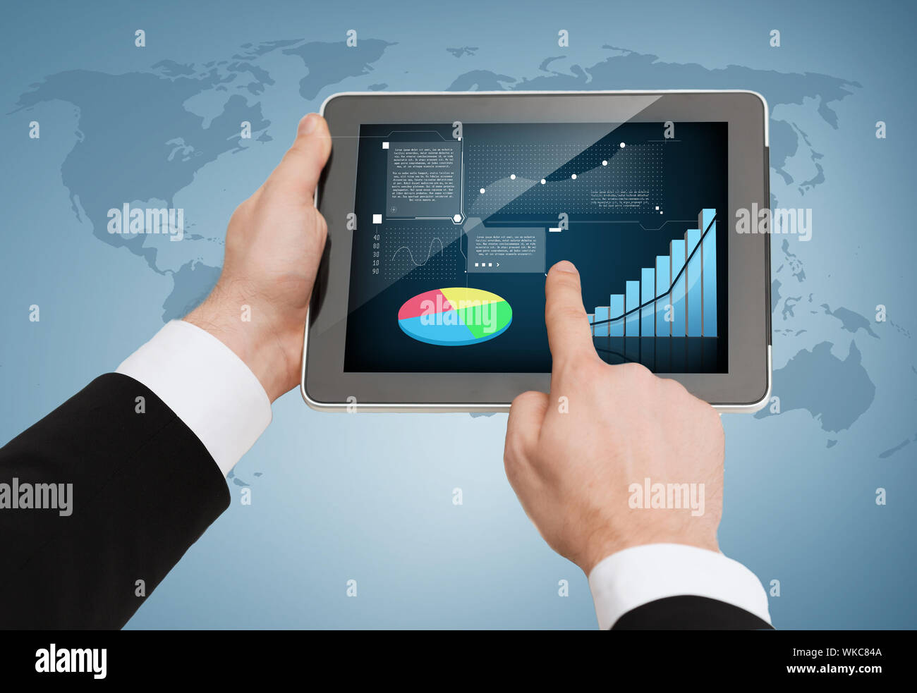 Tablet screen graph hands hi-res stock photography and images - Alamy