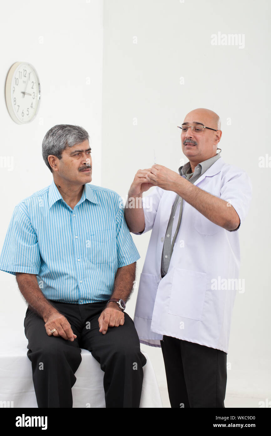 Indian doctor injection hi-res stock photography and images - Alamy