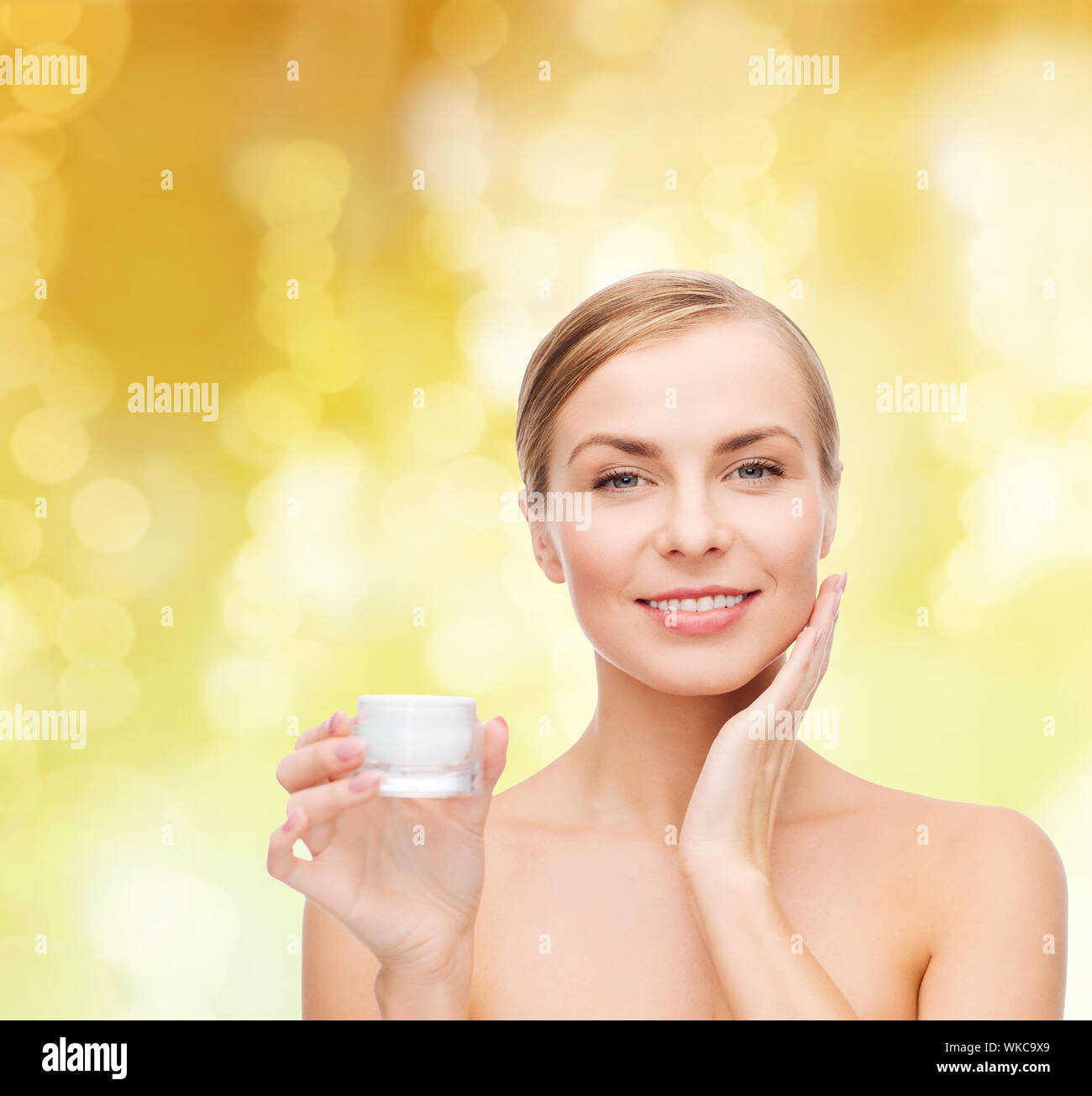 Cosmetics Health And Beauty Concept Beautiful Woman Applying Cream