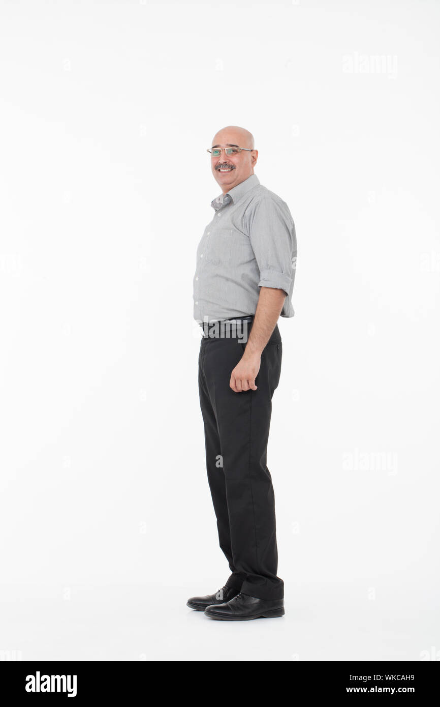 Side profile of a businessman standing Stock Photo - Alamy