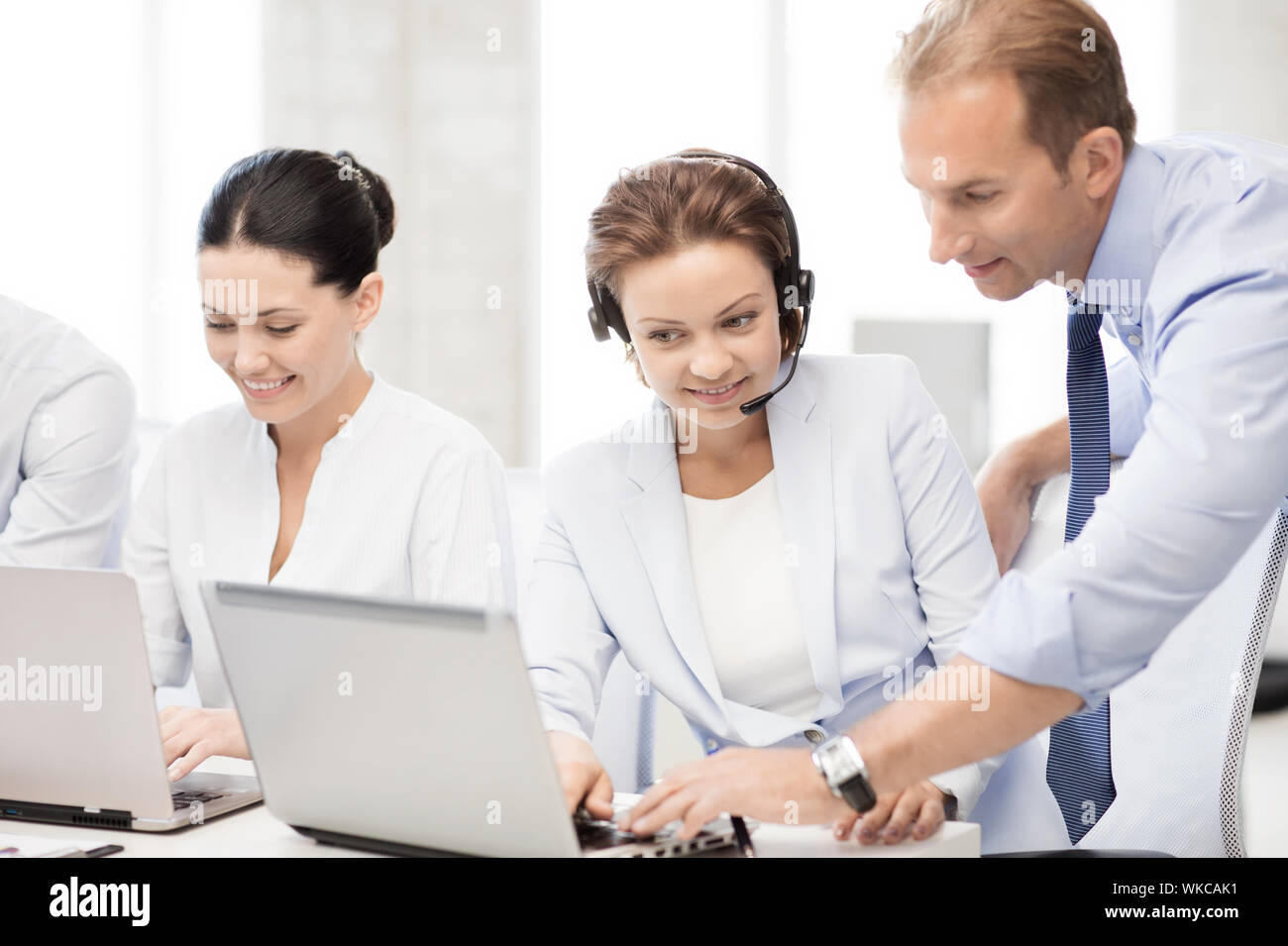 group of people working in call center Stock Photo - Alamy