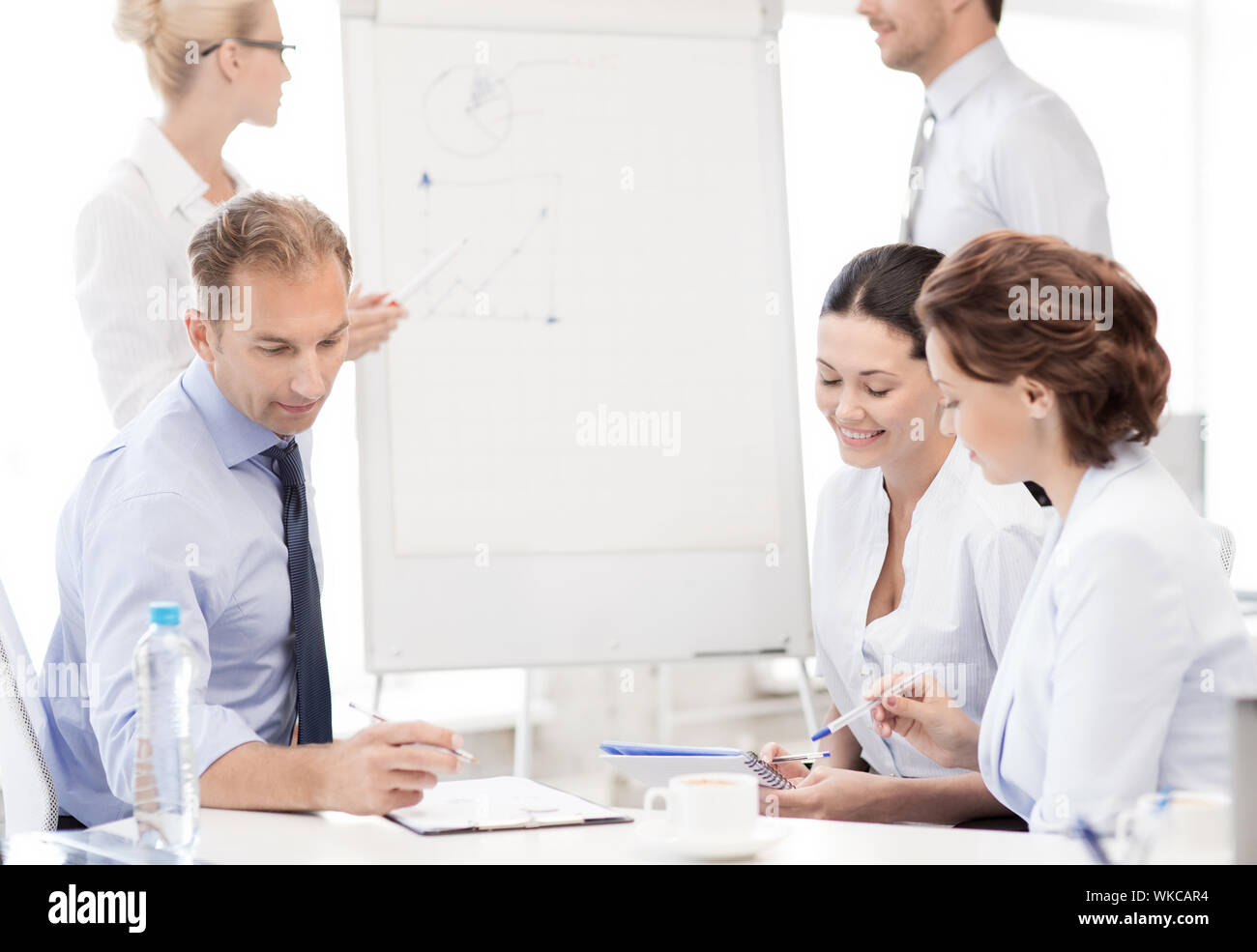 business team discussing something in office Stock Photo - Alamy