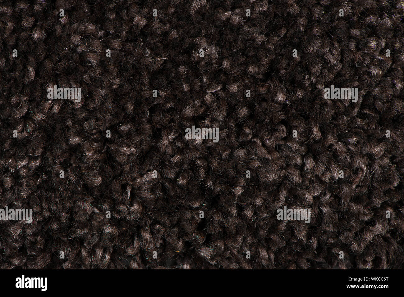 Closeup detail of brown carpet texture background Stock Photo - Alamy