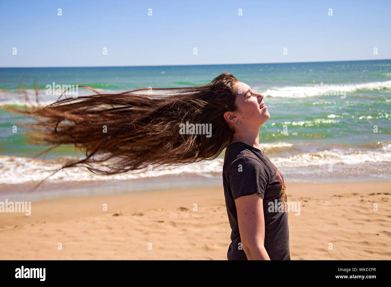 Hair blowing in wind hi-res stock photography and images - Alamy