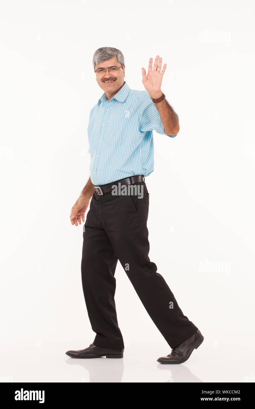 Old man waving goodbye hi-res stock photography and images - Alamy
