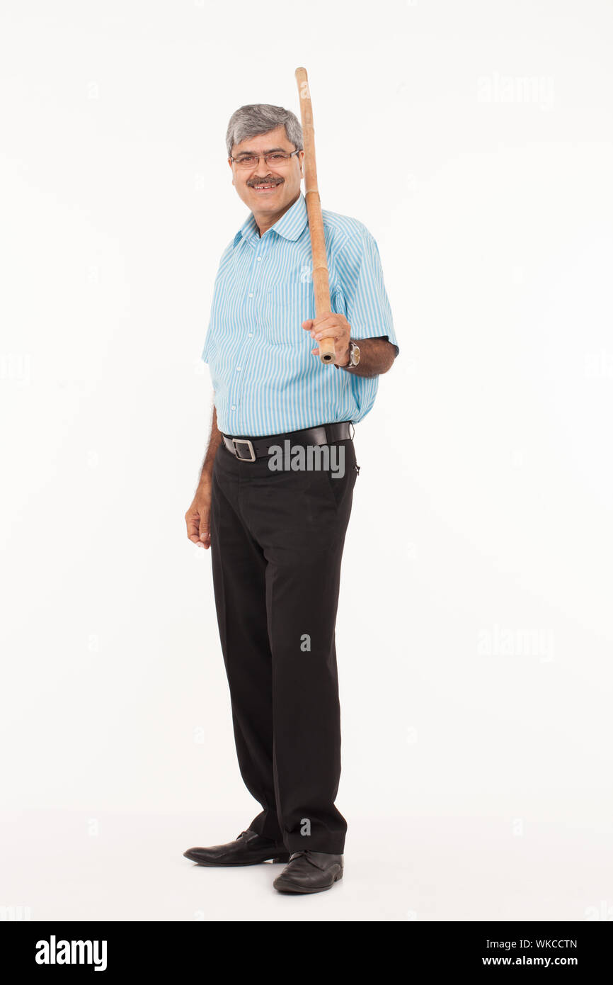 Man standing with his cane and smiling Stock Photo - Alamy